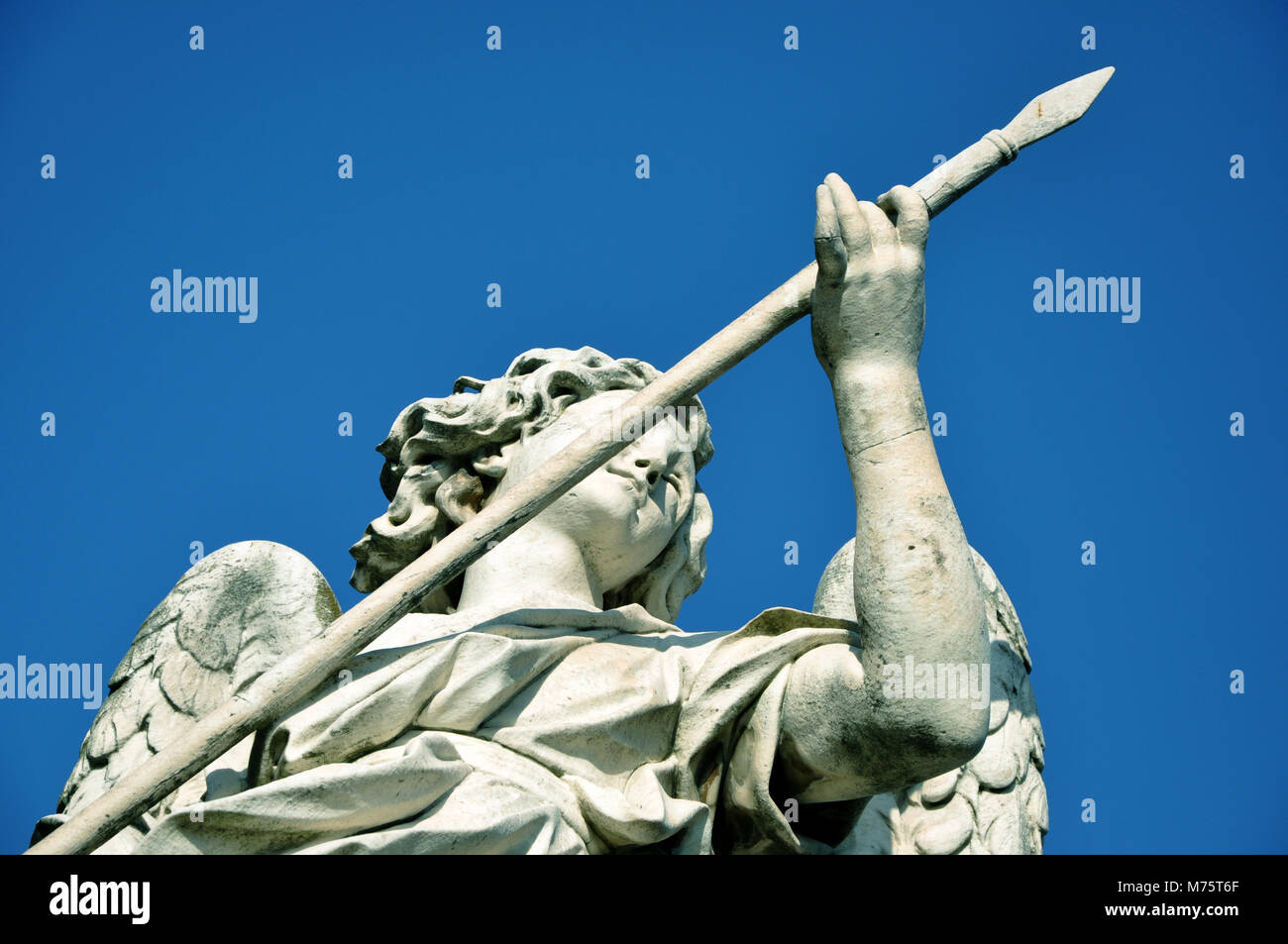 Marble statue of angel holding the Holy Lance of Longinus. Sant'Angelo ...
