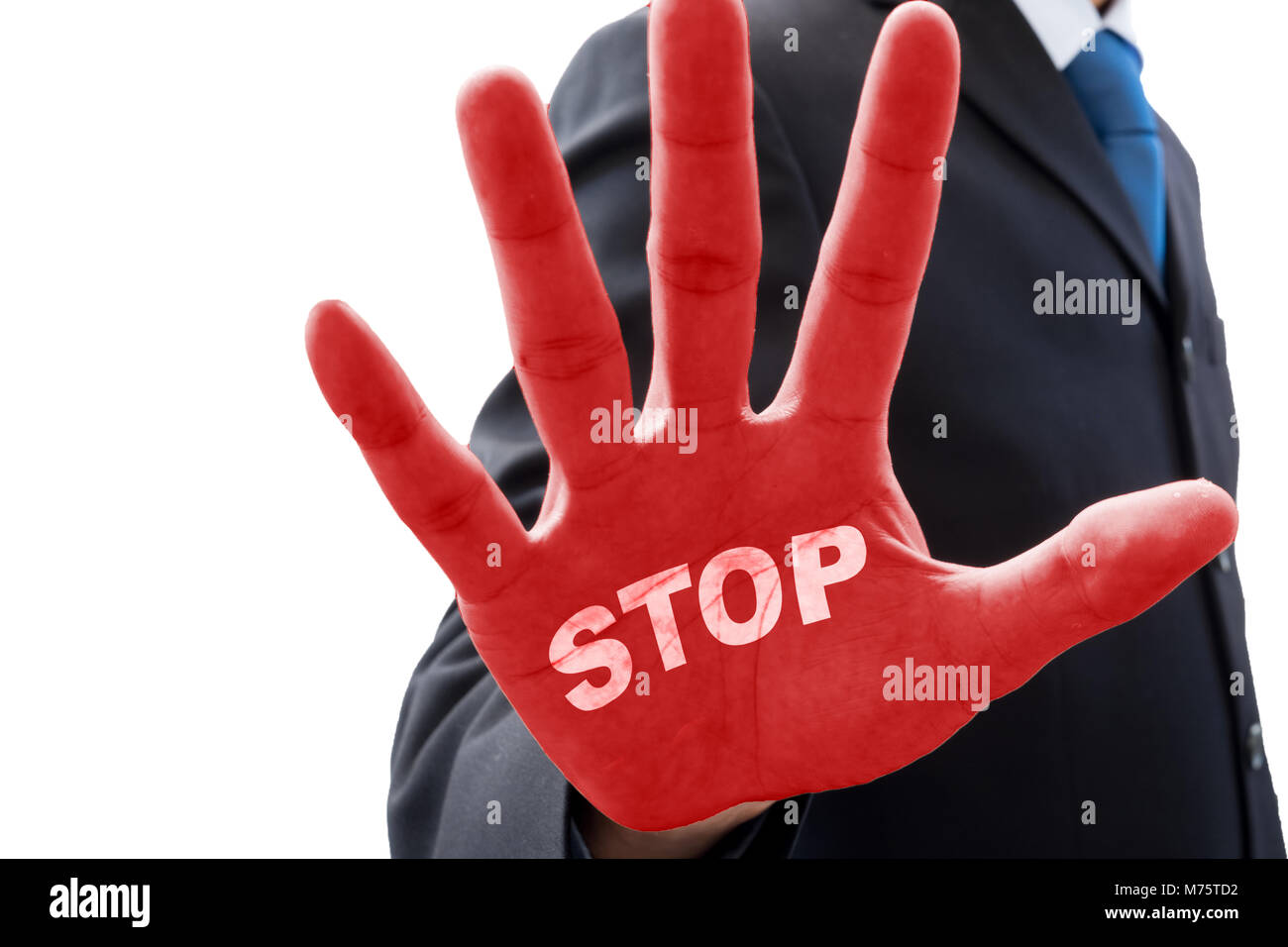 Businessman in dark gray suit raise his hand in action of stop and ...