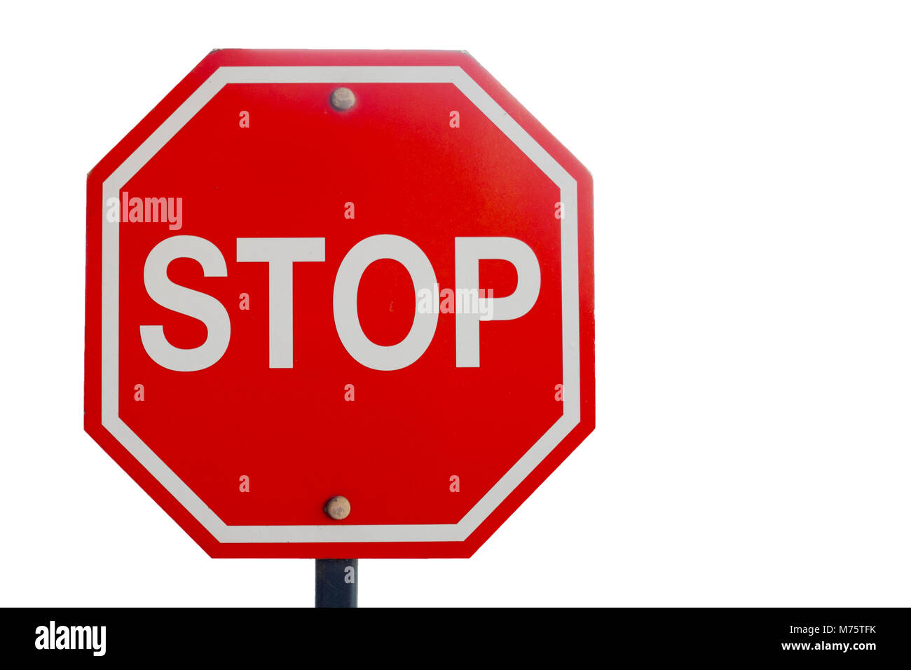 Isolated red "stop" sign post on white background Stock Photo - Alamy