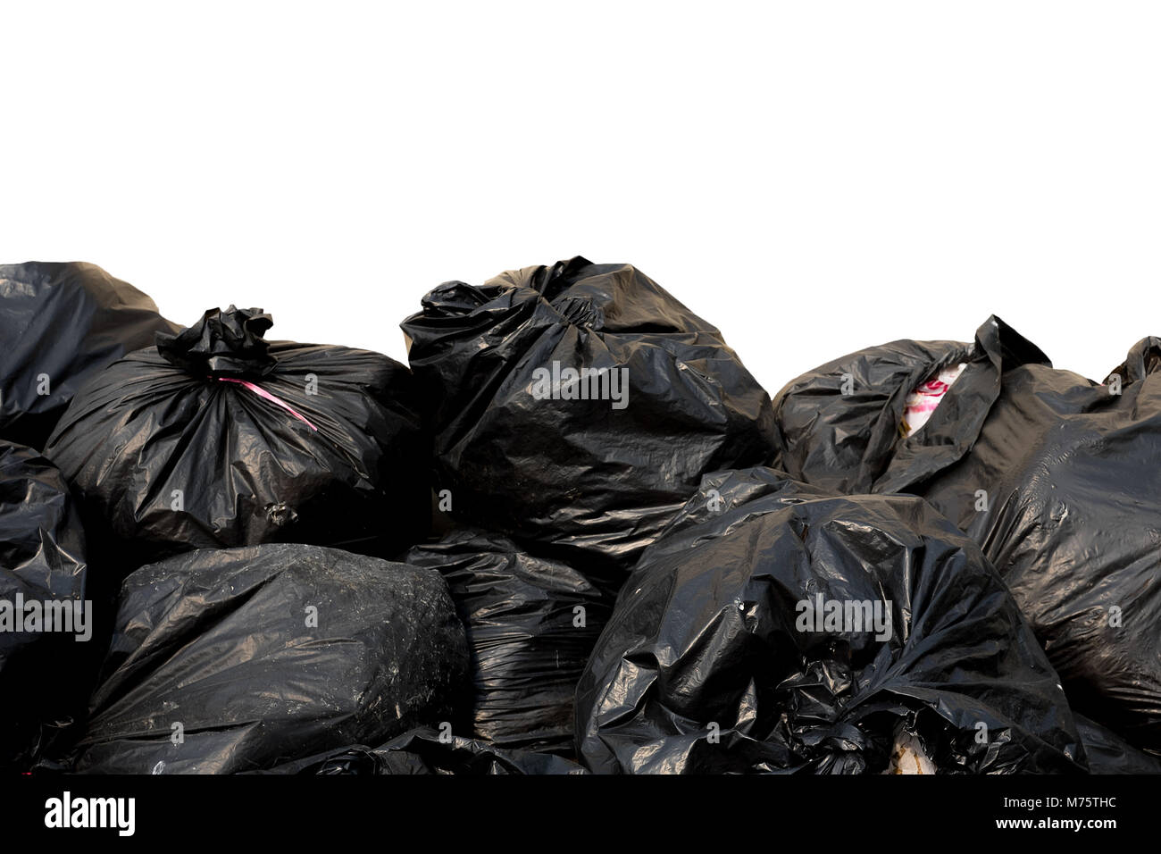 Stack of black garbage bags on white background Stock Photo - Alamy