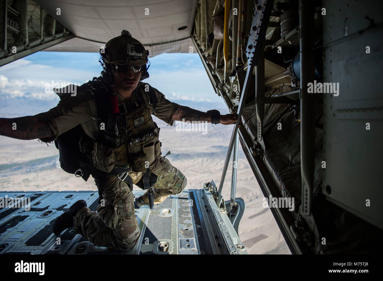 A U.S. Air Force pararescueman assigned to the 83rd Expeditionary ...