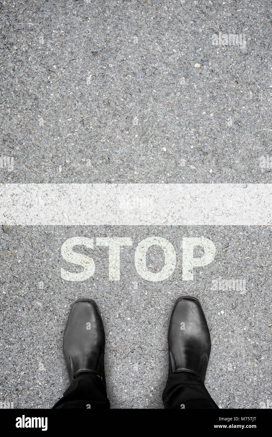 Black shoes standing at the STOP line and cannot go further Stock Photo ...