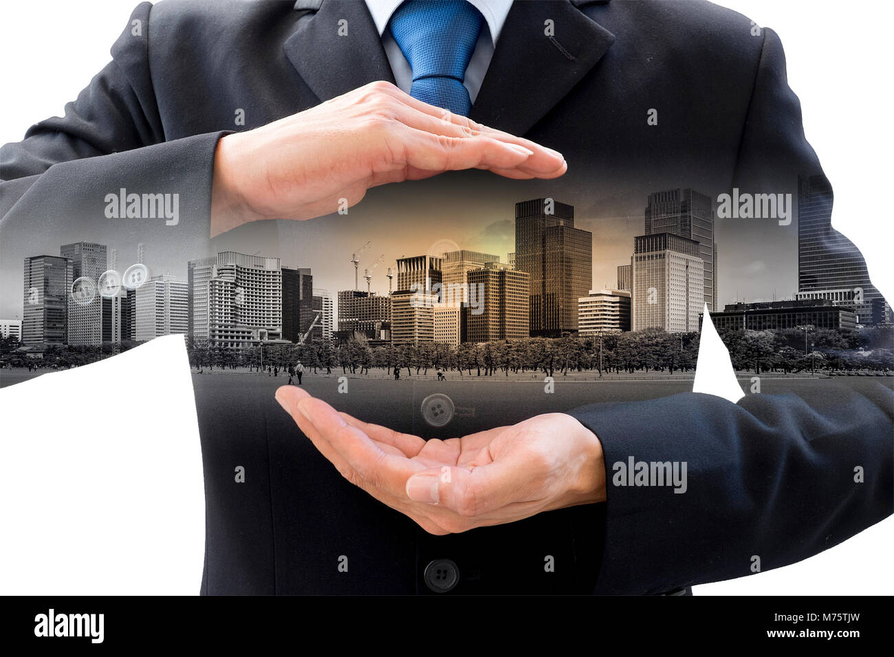 Double exposure businessman and cityscape between his hand of power ...