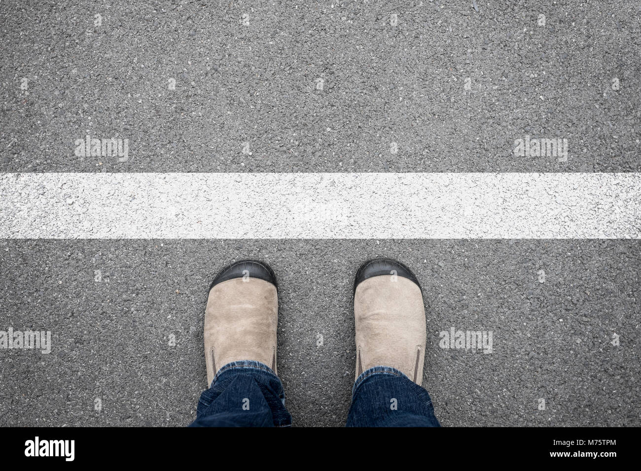 Brown suede shoes standing at the white line Stock Photo - Alamy