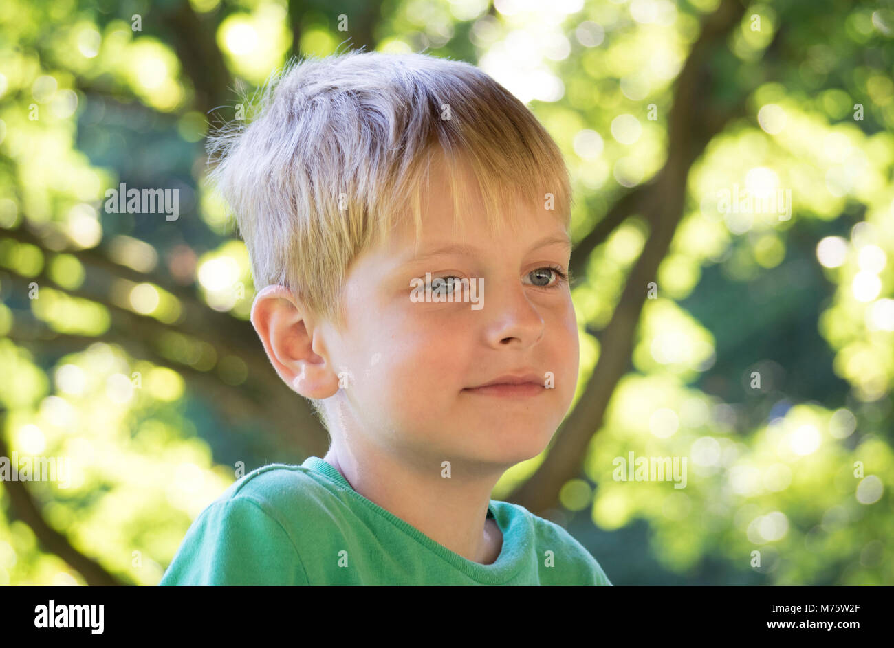 Cute caucasian boy outdoors Stock Photo - Alamy