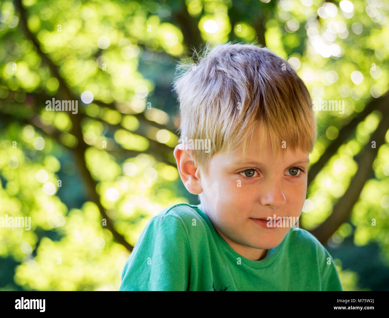 Cute caucasian boy outdoors Stock Photo - Alamy