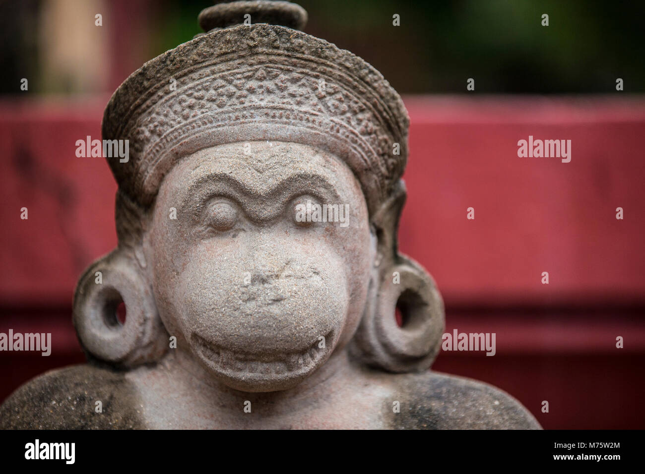 Cambodian monkey looking mythical creature grey stone sculpture with ...