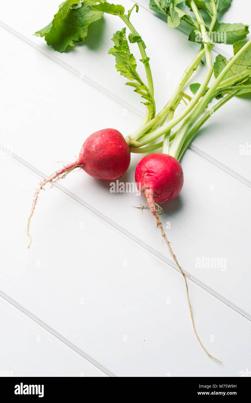Radish in white table Stock Photo - Alamy