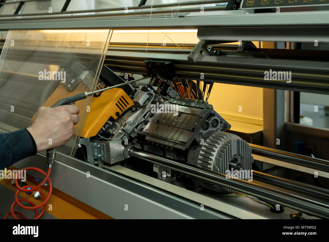 Knitting machine hi-res stock photography and images - Alamy