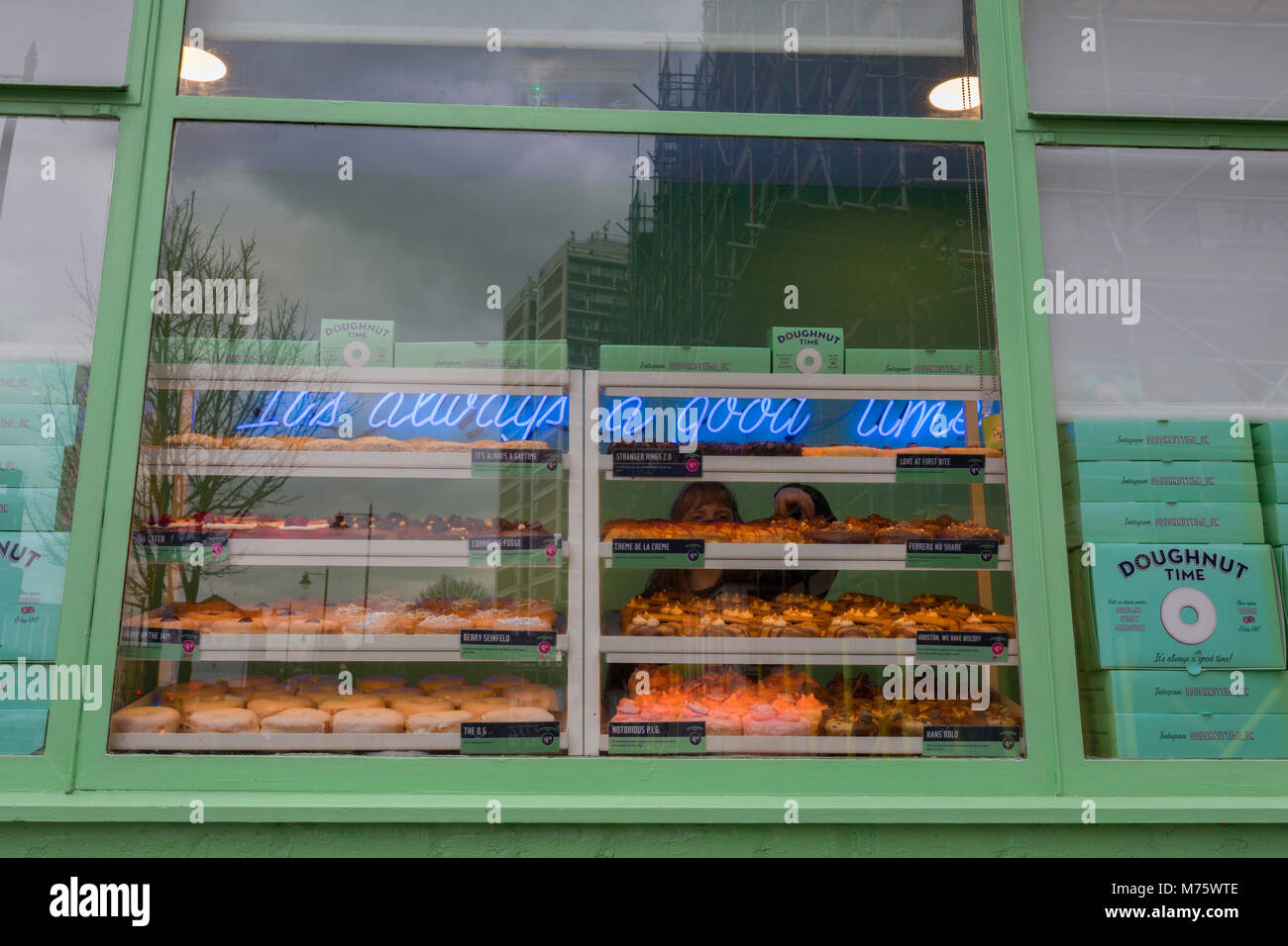 The enticing shop window of Doughnut Time on Old Street in Shoreditch ...