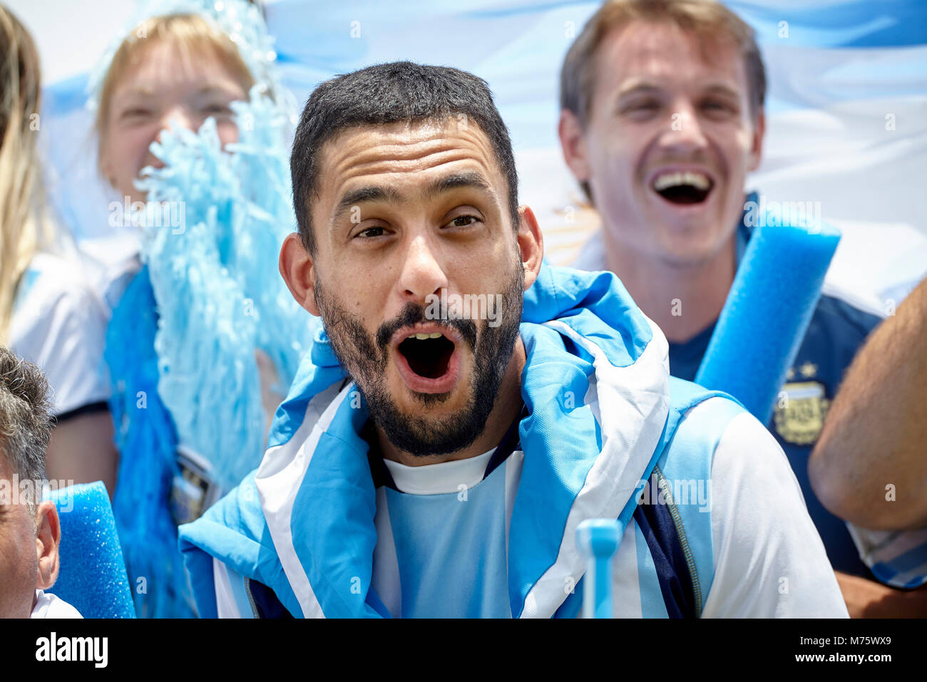 Argentinian football fans cheering at match Stock Photo - Alamy