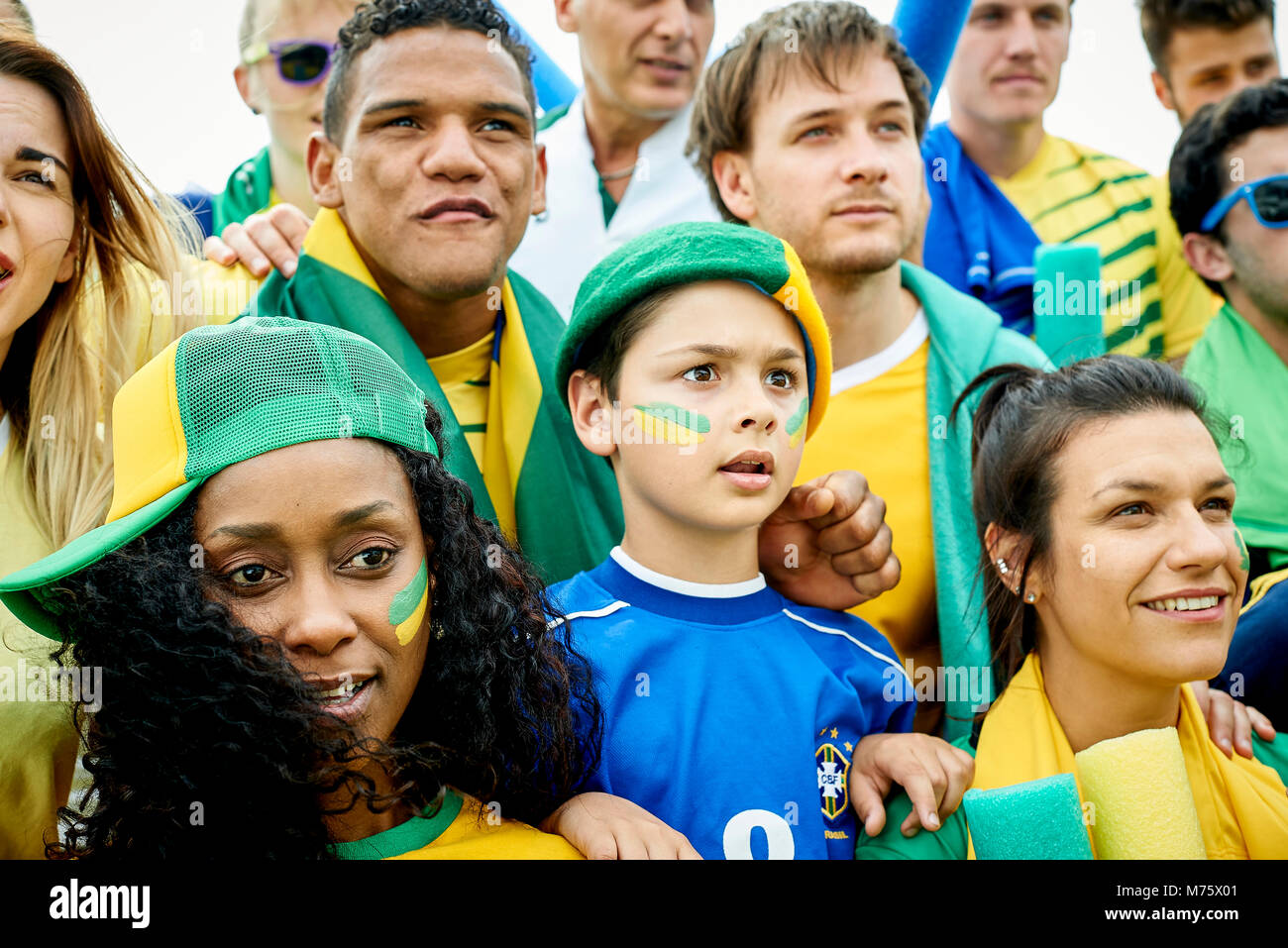 Brazilian football fans watching football match Stock Photo - Alamy