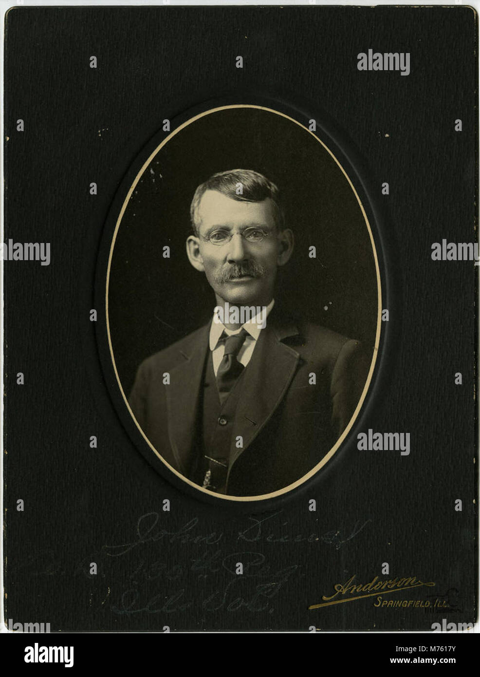 John Simms, identified in this photograph, is a historical figure or ...