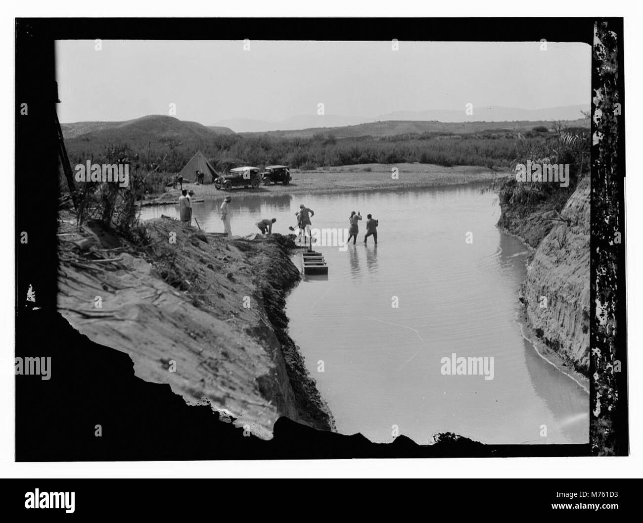 A scenic view of the Jordan River, captured in a historical photograph ...
