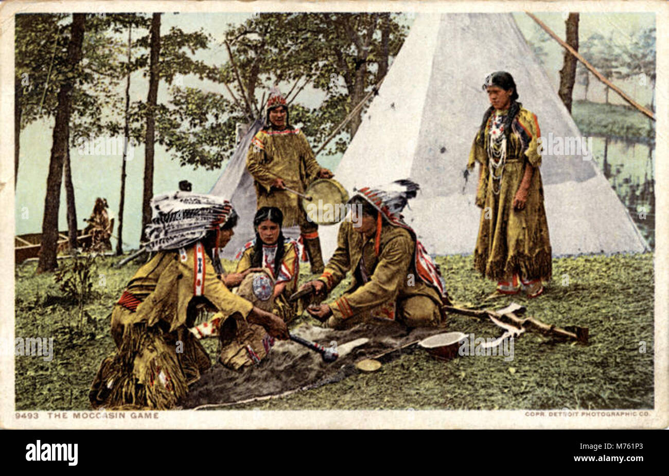 The moccasin game, a traditional Native American game, is depicted in ...