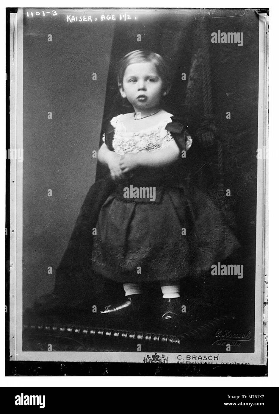 This photograph shows a young child, Kaiser, aged one and a half, taken ...