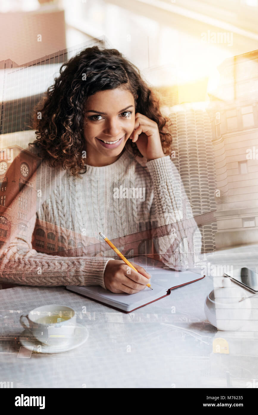Talented young writer working at her first book Stock Photo - Alamy
