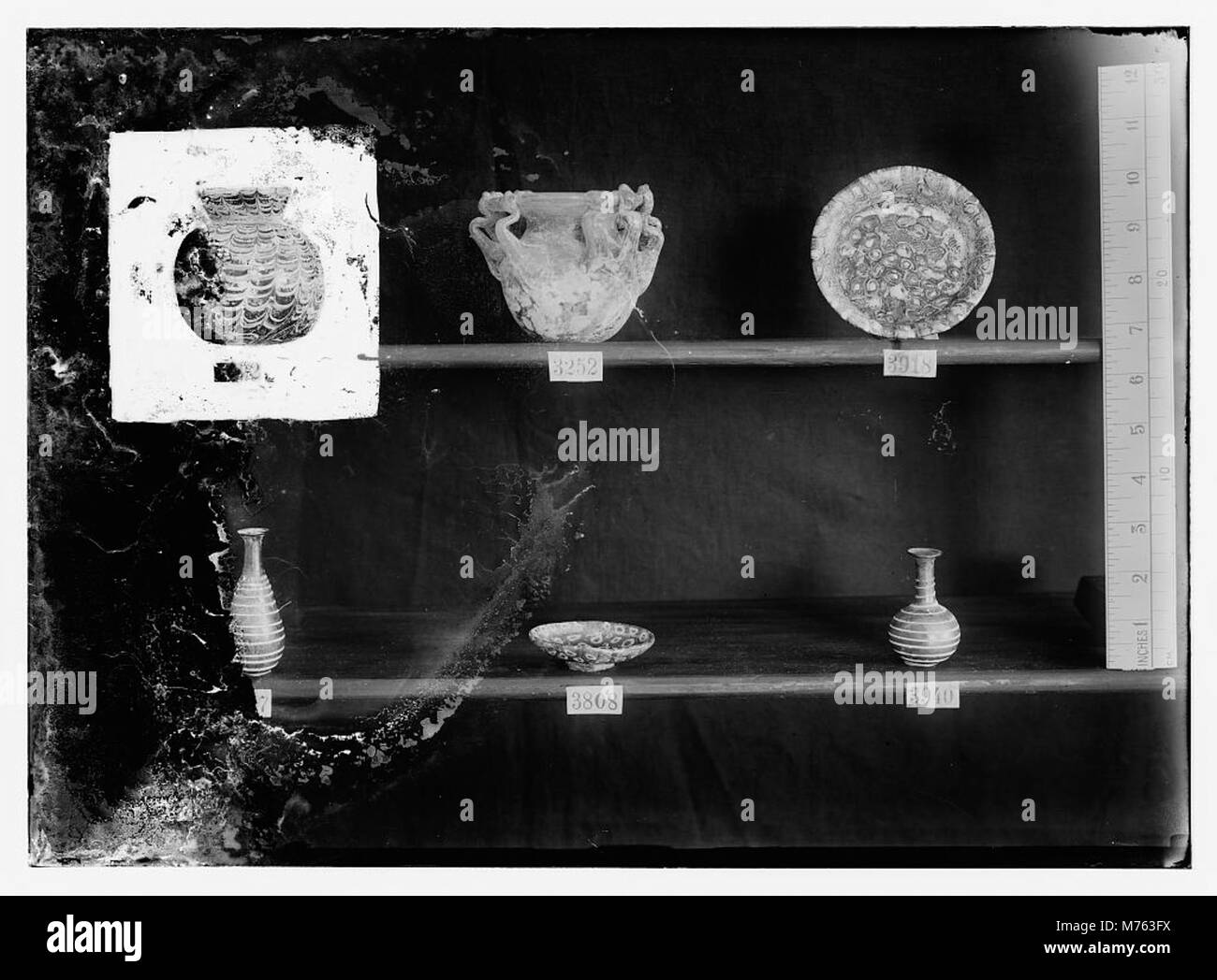 A collection of antique glass items, showcasing craftsmanship and ...