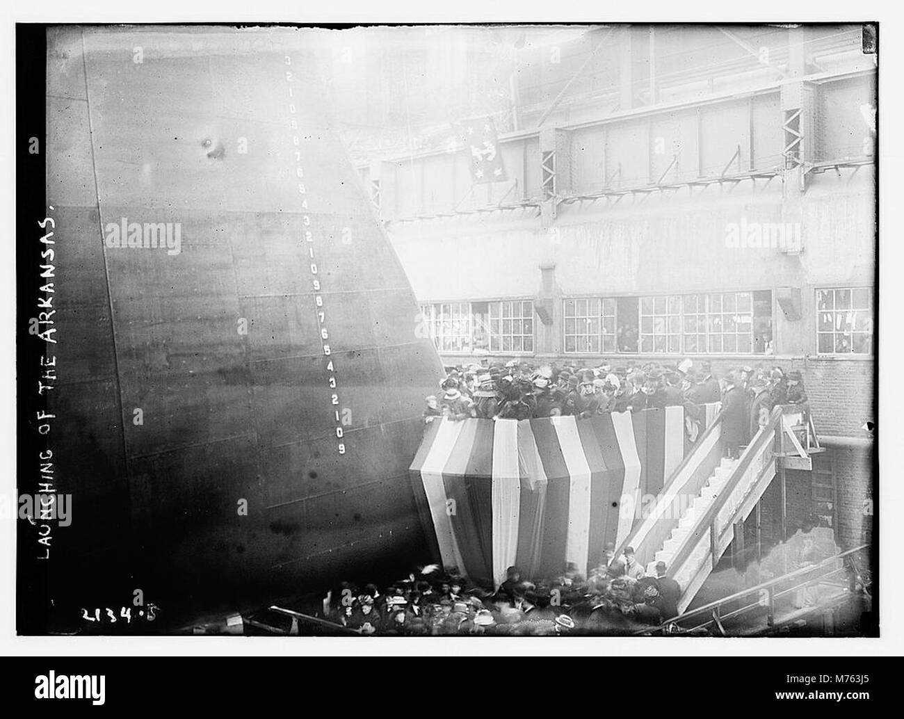 A photograph documenting the launching of the USS Arkansas, a ...