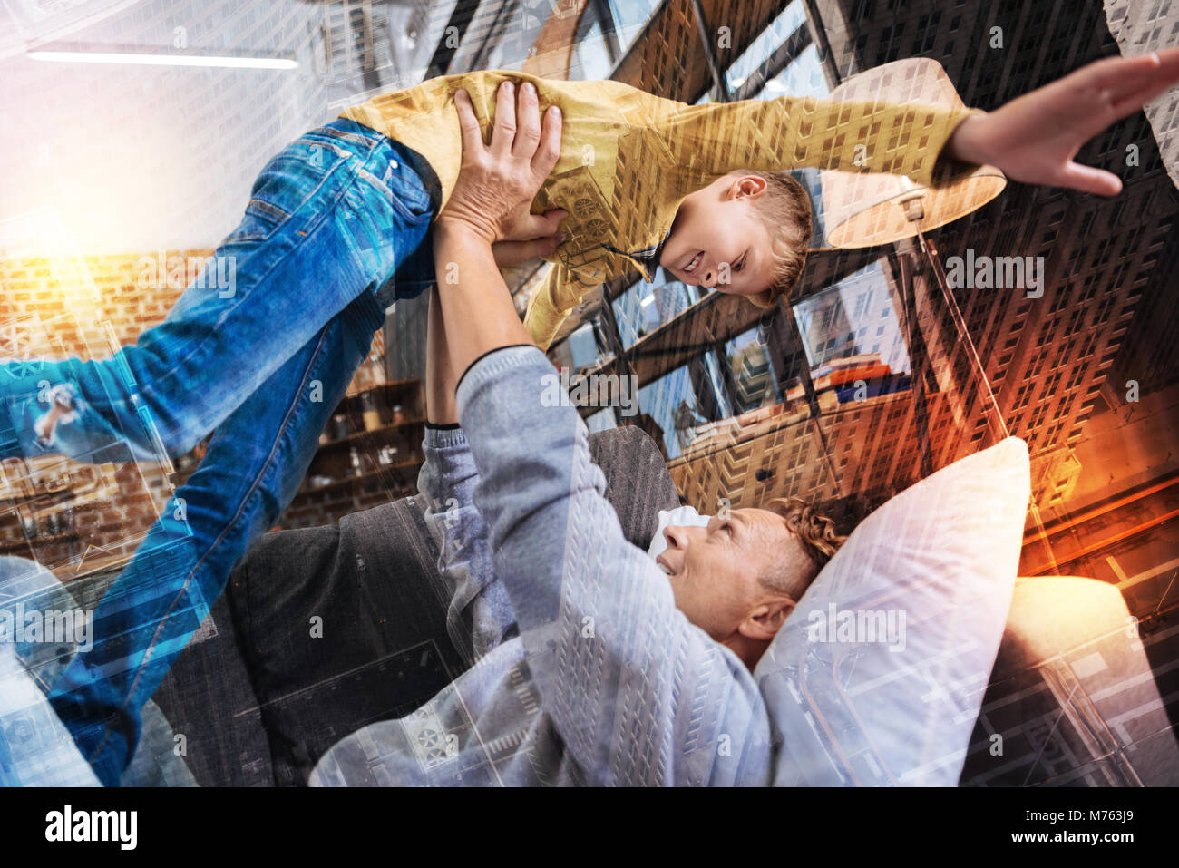 Boy trying to fly hi-res stock photography and images - Alamy