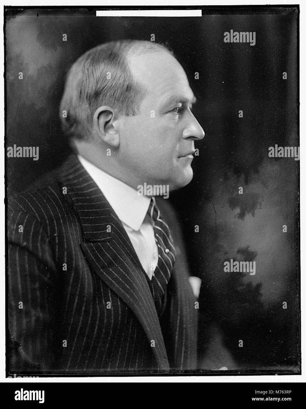 A formal portrait of R.M. Leach, the Honorable, showcasing his ...