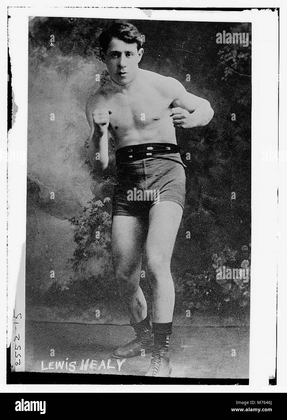 This image features Lewis Healy, captured in a formal portrait ...