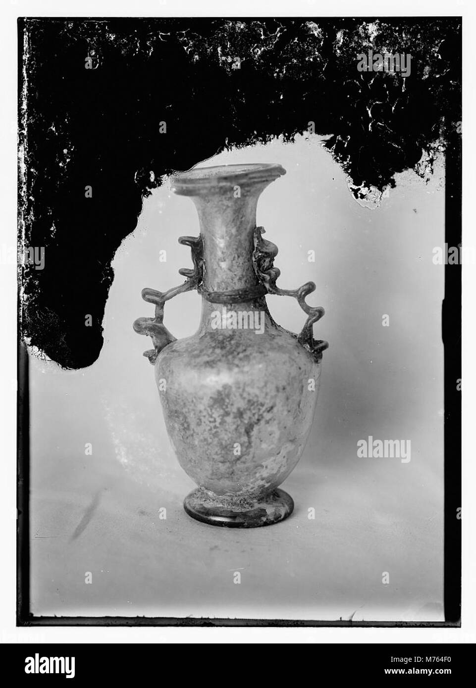 This piece of antique Roman glass showcases the intricate craftsmanship ...