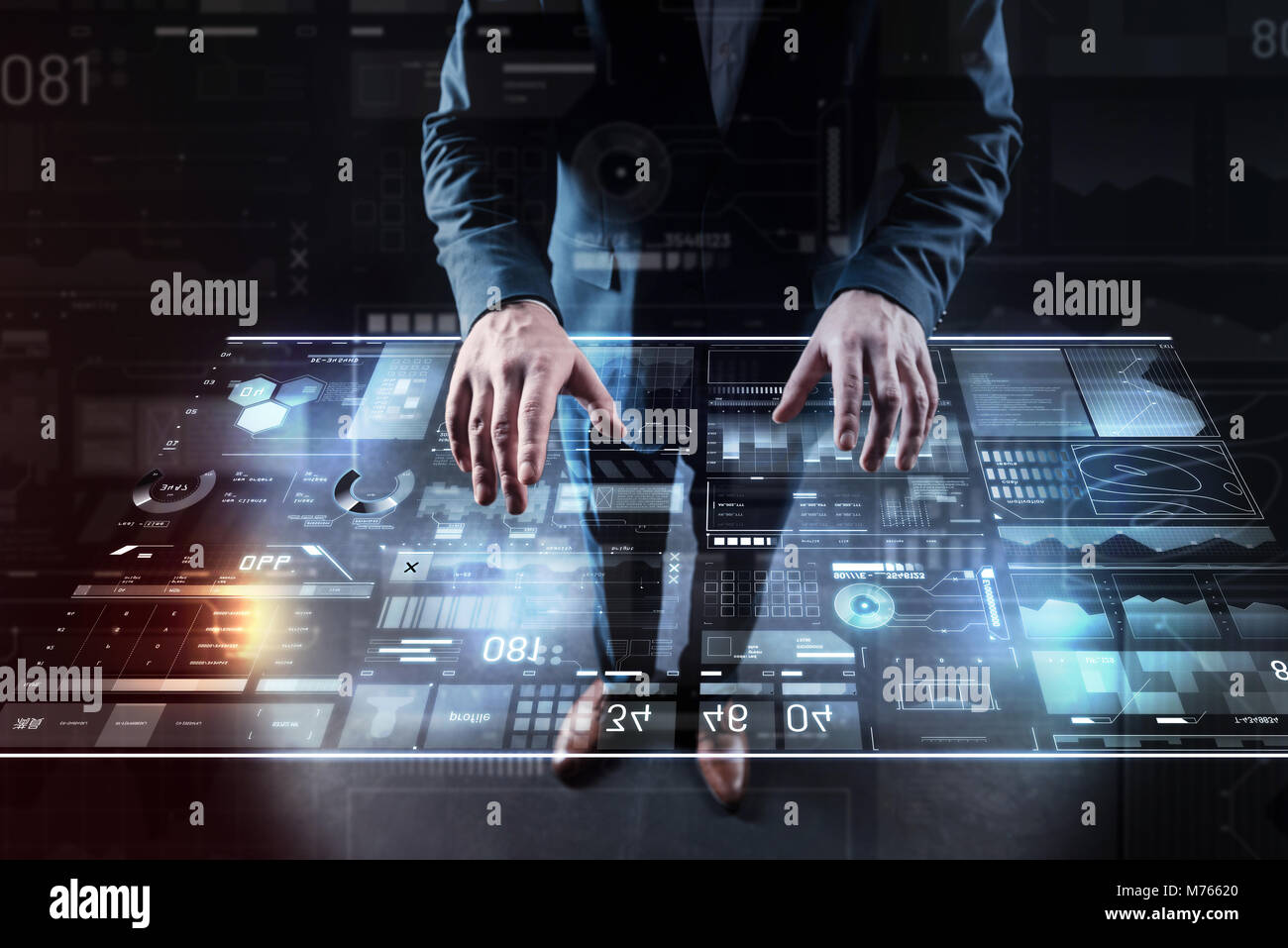Concentrated programmer touching the screen while creating a new ... Concentrated programmer touching the screen while creating a new ...