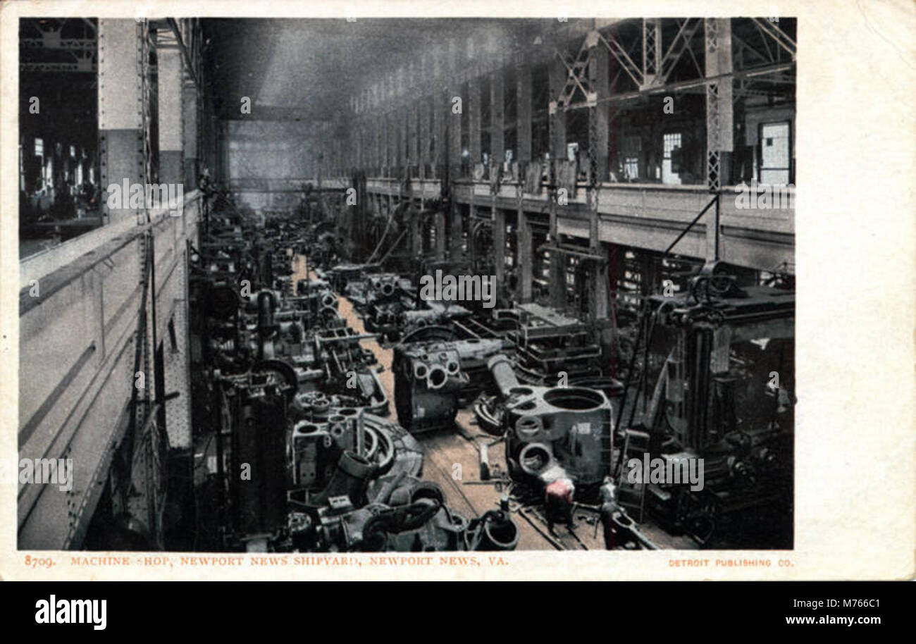 The image shows the interior of a machine shop at Newport News Shipyard ...