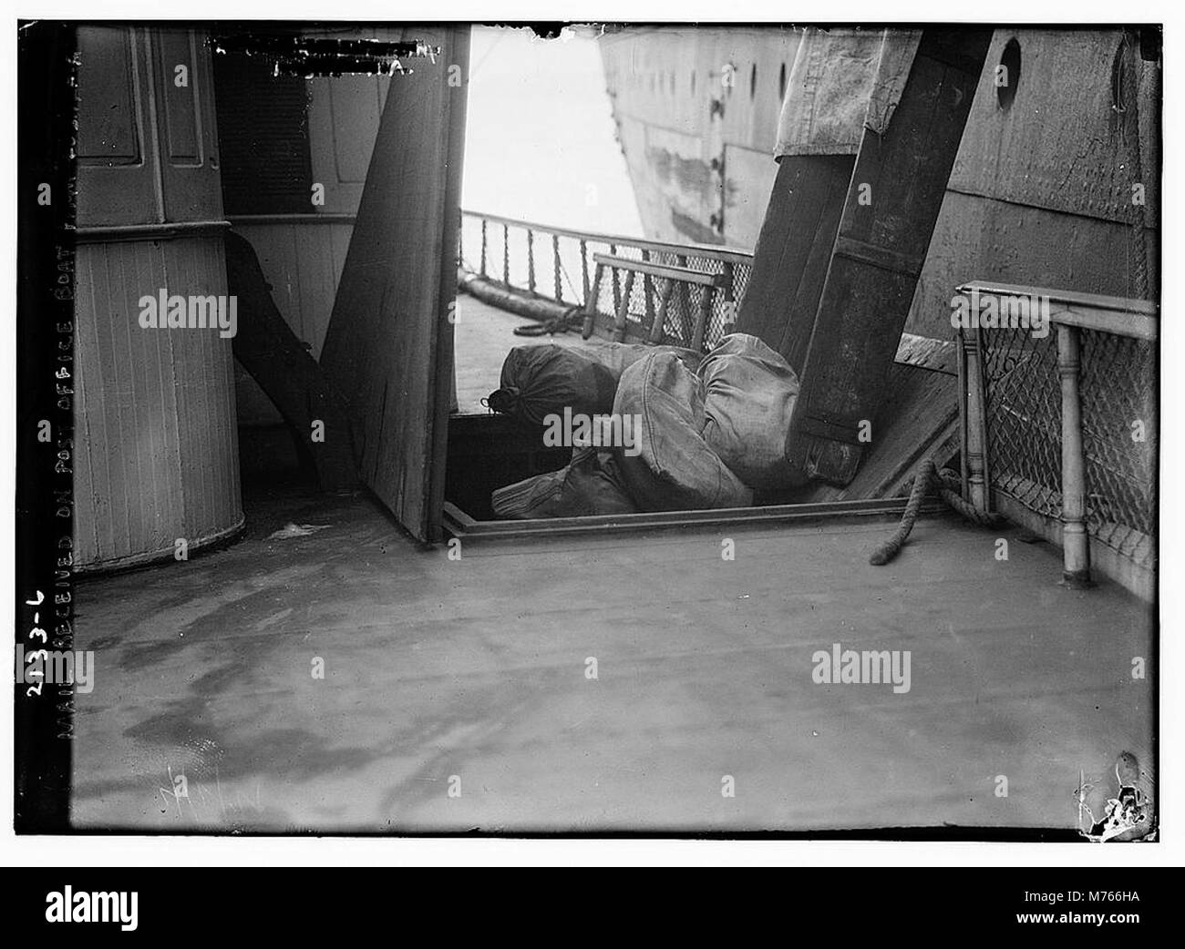 An image showing the receipt of mail on a Post Office boat, capturing ...
