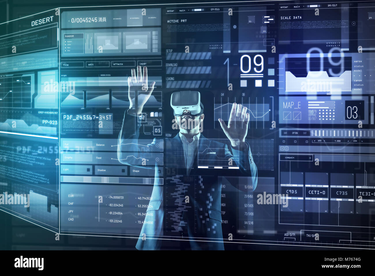 Impressed programmer looking up while being in virtual reality glasses Stock Photo - Alamy