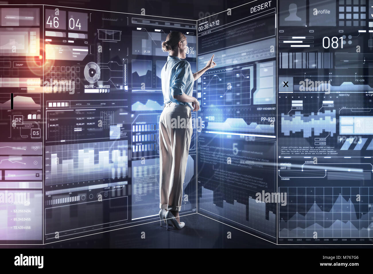 Calm woman working at the computer and looking elegant Stock Photo - Alamy