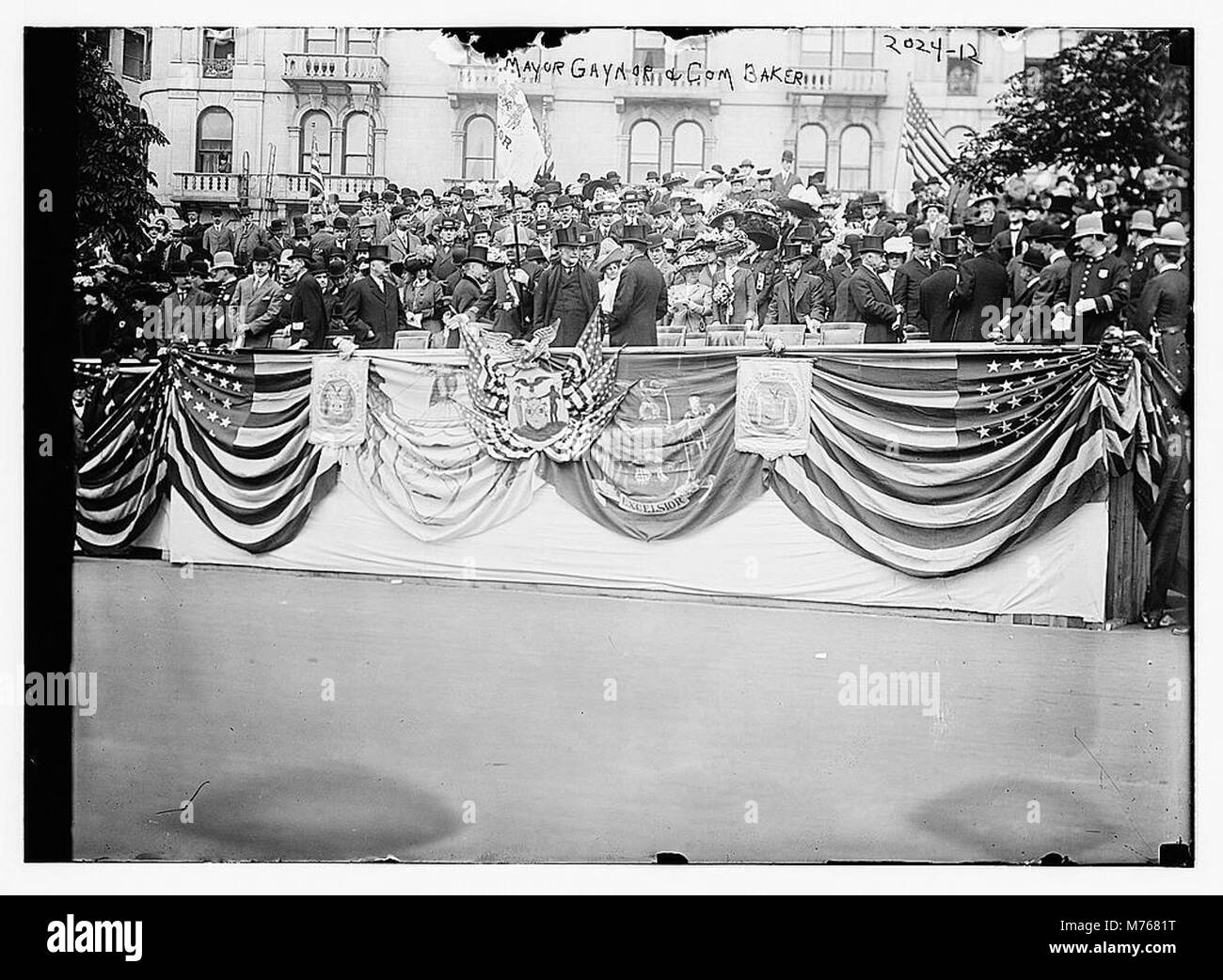 A photograph featuring Mayor Gaynor and Commissioner Baker, likely ...