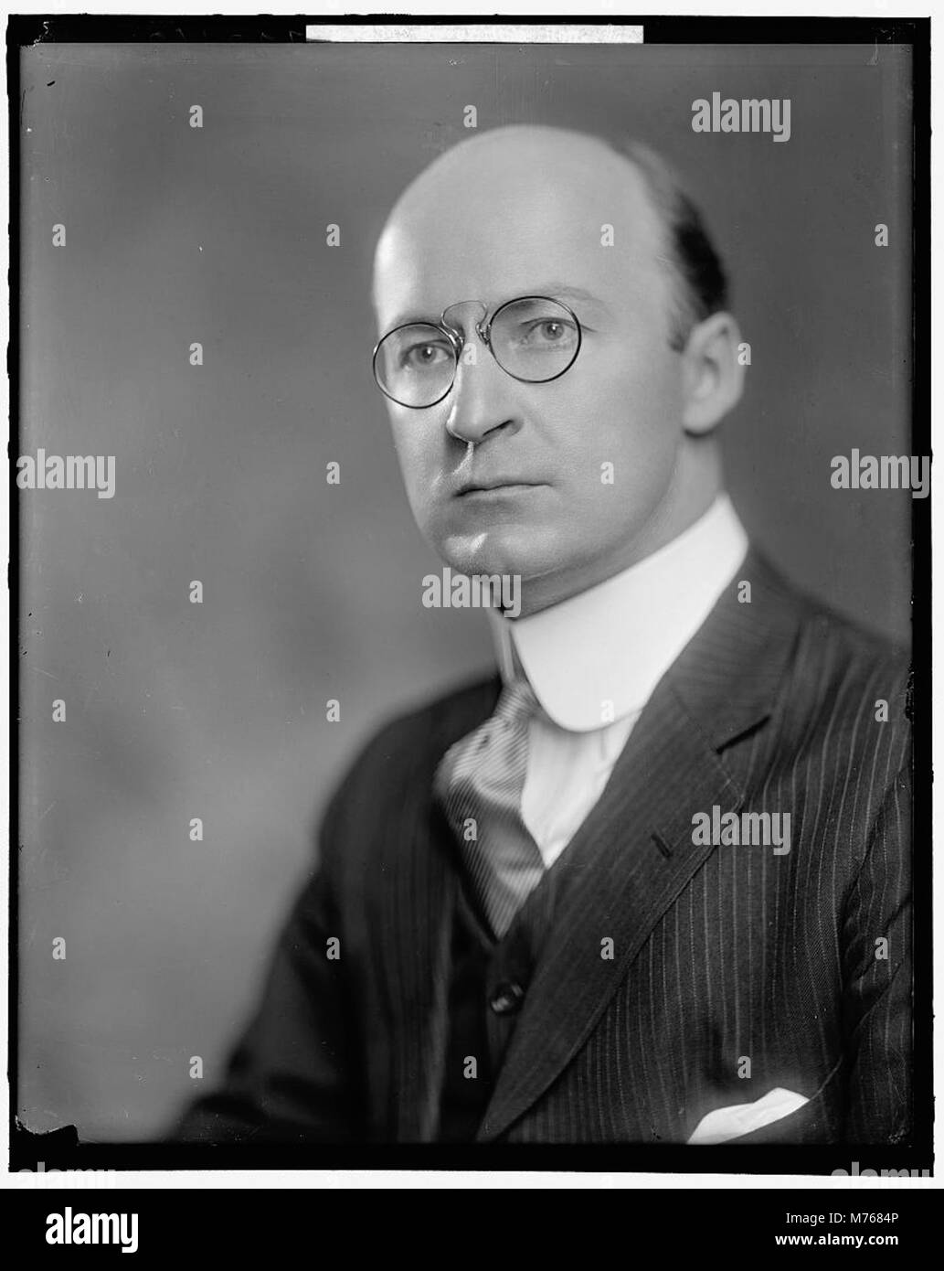 A formal portrait of W. McCormick, an honorable individual captured in ...