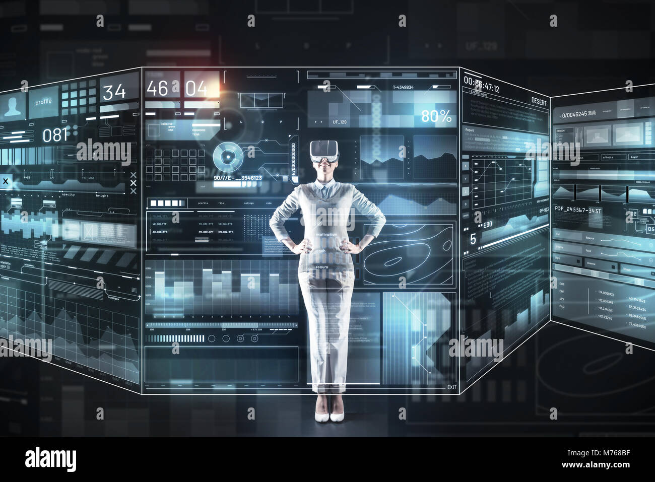 Positive programmer smiling and looking at the screen in virtual reality glasses Stock Photo - Alamy