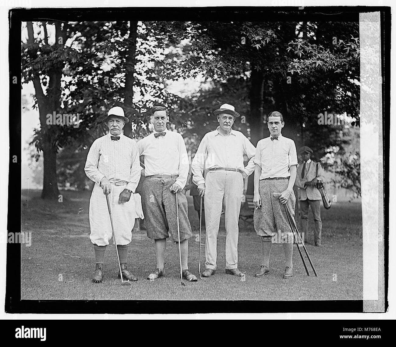 This photograph shows members of the Senate alongside newspaper men ...