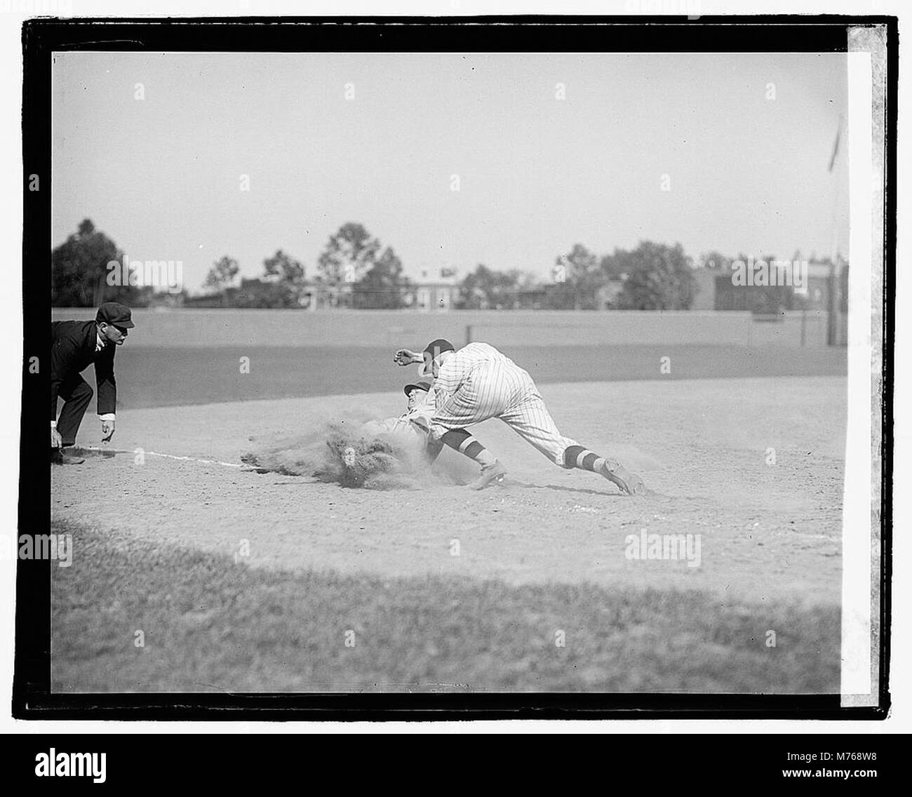 An image showing the moment when Meusel was thrown out at third base ...