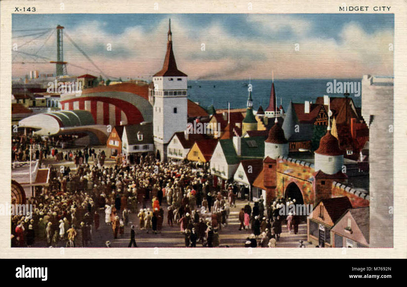 The image depicts a Midget Village, a miniature village set up as an ...