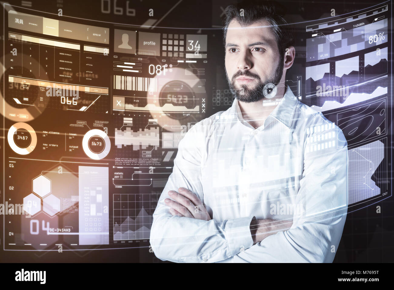 Confident programmer standing with his arms crossed and thinking Stock ...