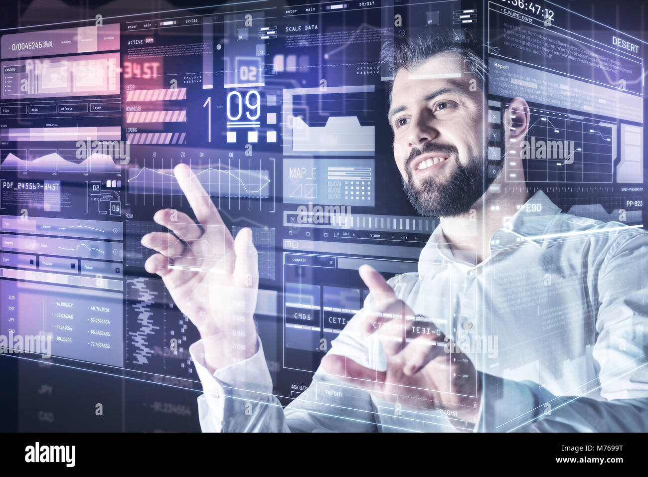 Positive programmer smiling while solving a technical problem Stock ...