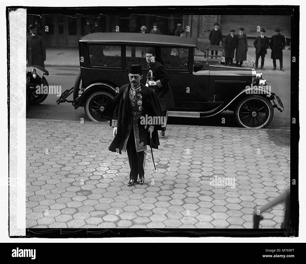 This portrait shows Mirza Hussein Khan Alai, a prominent figure, on ...