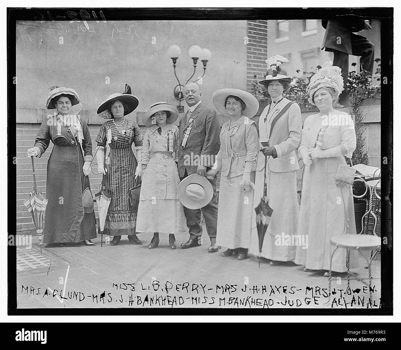 This photograph features several women, including Miss L.B. Perry, Mrs ...