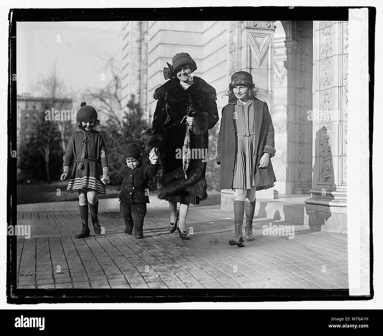 A photograph of Mme. Edgar Prochnik with her children, dated December 7 ...