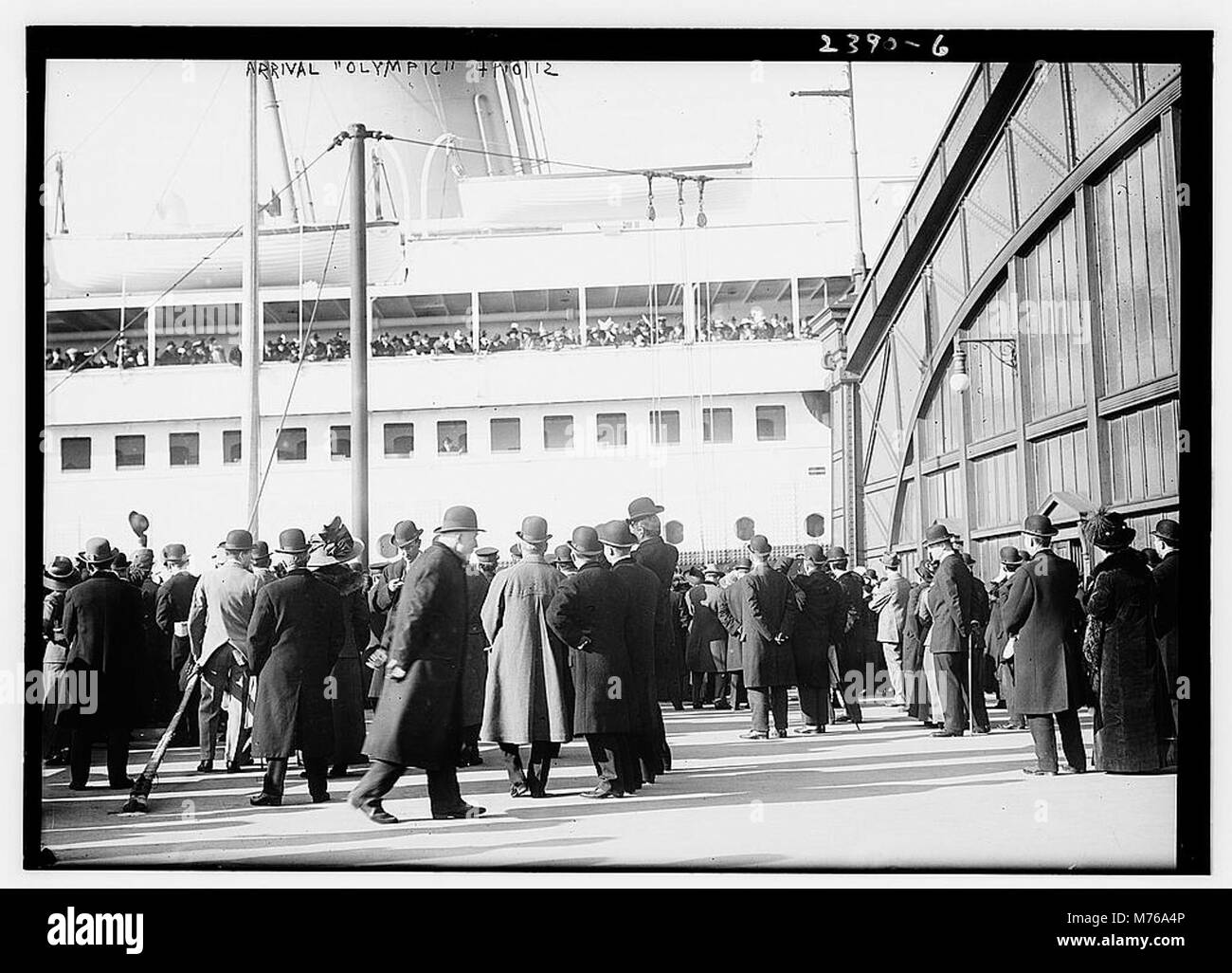 This photograph captures the arrival of the RMS Olympic, one of the ...