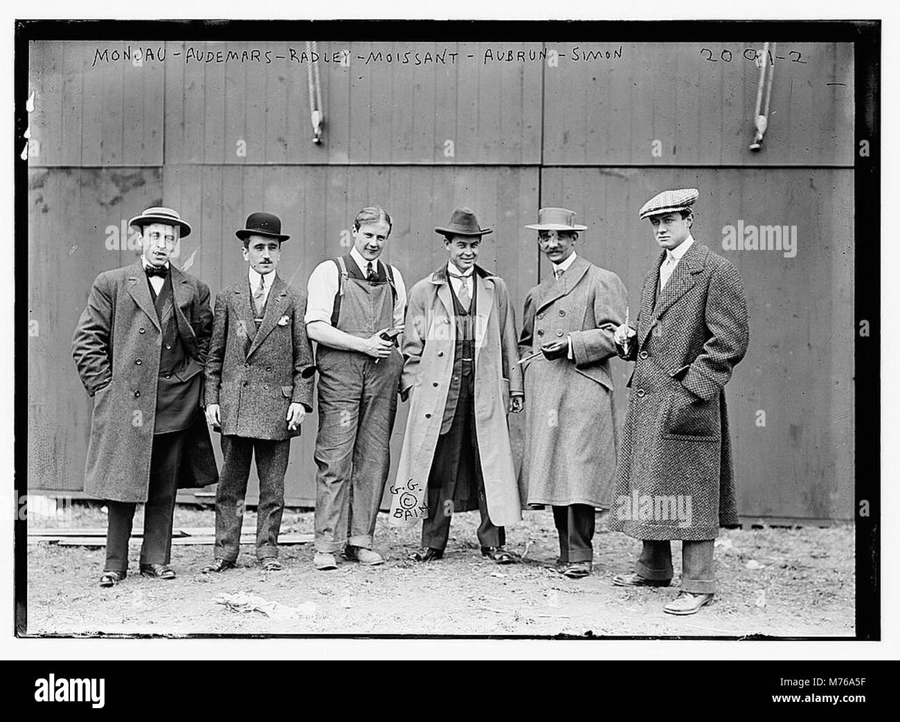 A group portrait of individuals, possibly notable figures in an ...