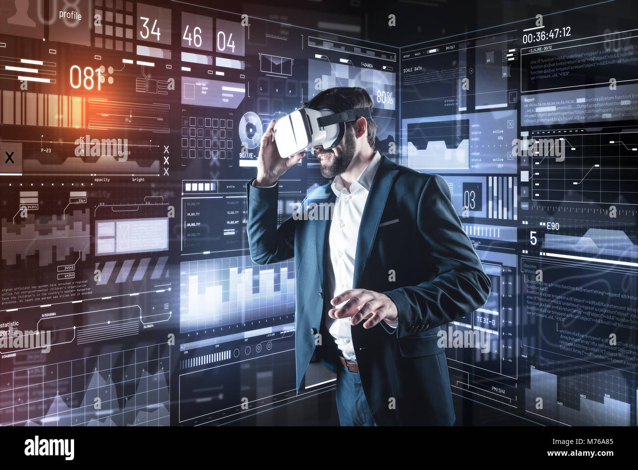 Progressive specialist wearing virtual reality glasses while working ...