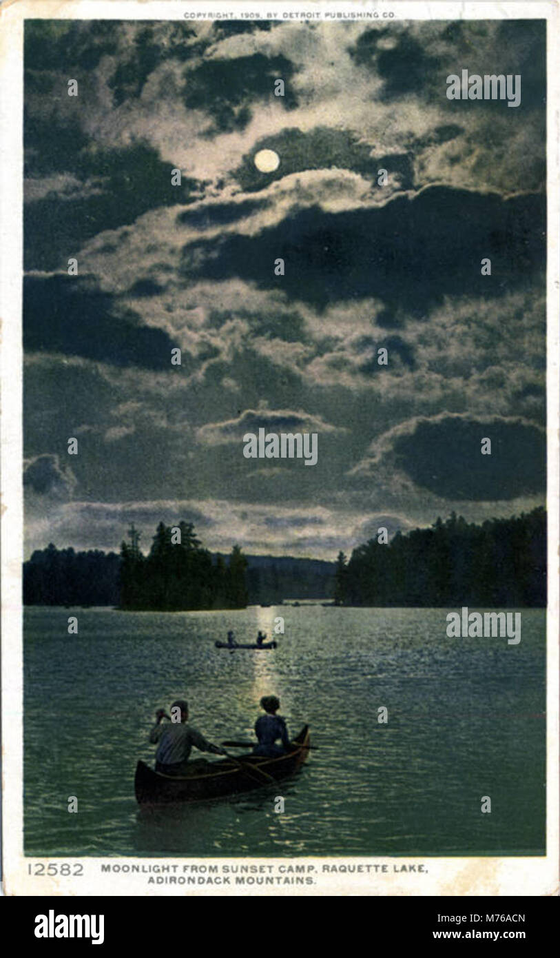 A serene view of Raquette Lake at Sunset Camp, capturing the ...