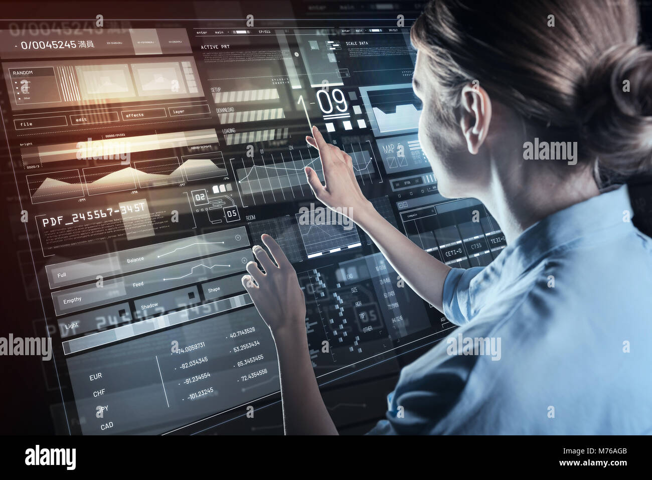 Professional programmer doing her usual part of work while being alone ...