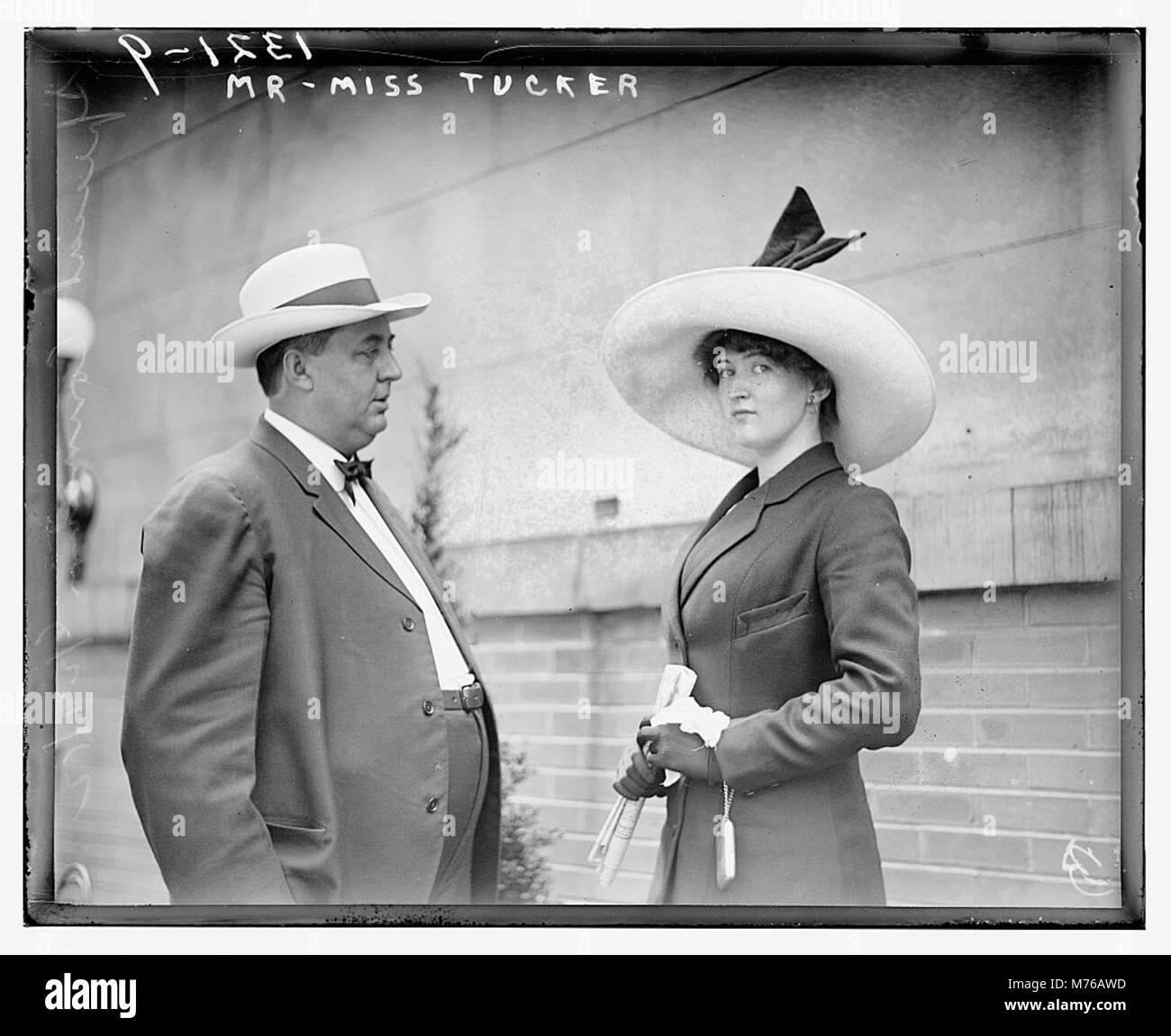 A portrait of Mr. and Miss Tucker, captured in a formal setting. The ...