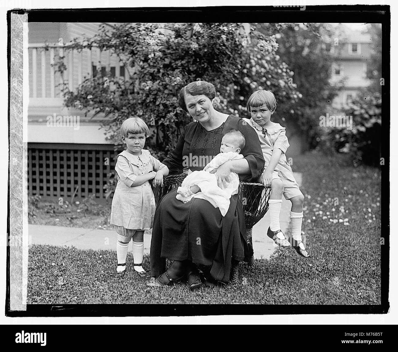 A photograph capturing Mrs. Clyde Kelly and her children on June 1 ...